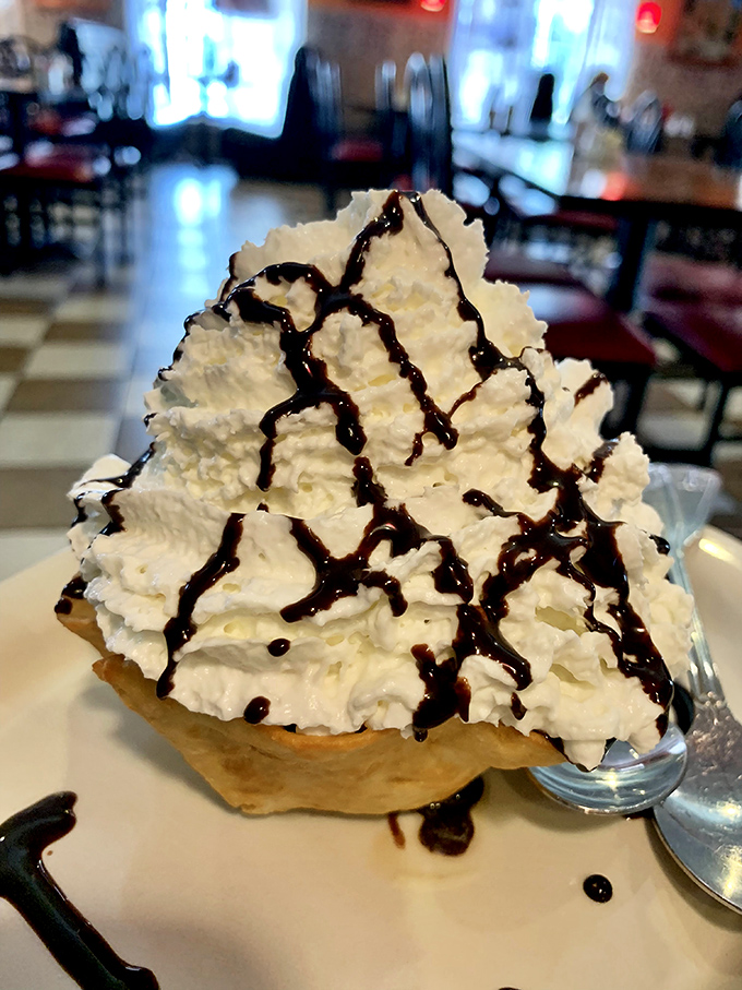 This dessert doesn't whisper sweet nothings &ndash; it shouts them from a mountain of whipped cream drizzled with chocolate in a crispy shell.