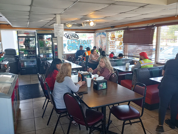 The true measure of a great restaurant: happy diners of all backgrounds sharing tables and trading smiles over plates of authentic Mexican goodness.