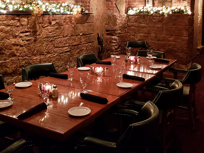 Stone walls that once kept people in now create intimate dining spaces where the only sentence is to clean your plate.