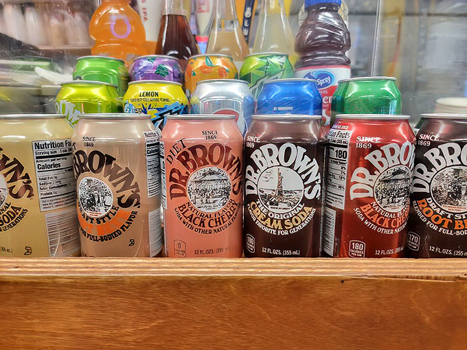 Dr. Brown's sodas line up like old friends at a reunion &ndash; Cel-Ray, Black Cherry, and Cream Soda waiting to wash down your pastrami with vintage charm.