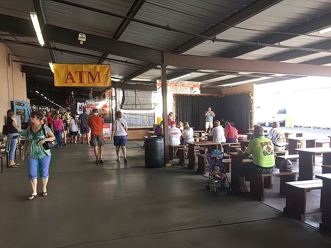 The market's social hub, where weary shoppers refuel with snacks and compare their treasures before diving back into the hunt.