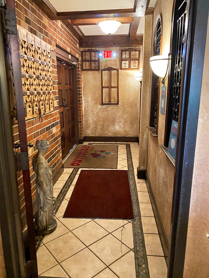 An entrance that sets the stage for what's to come—part Italian villa, part Maryland charm. That statue silently promises good things await beyond the threshold.