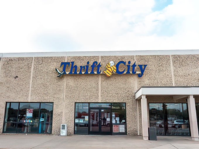 The Thrift City sign beckons bargain hunters like a lighthouse for the budget-conscious. Adventure awaits beyond those glass doors.
