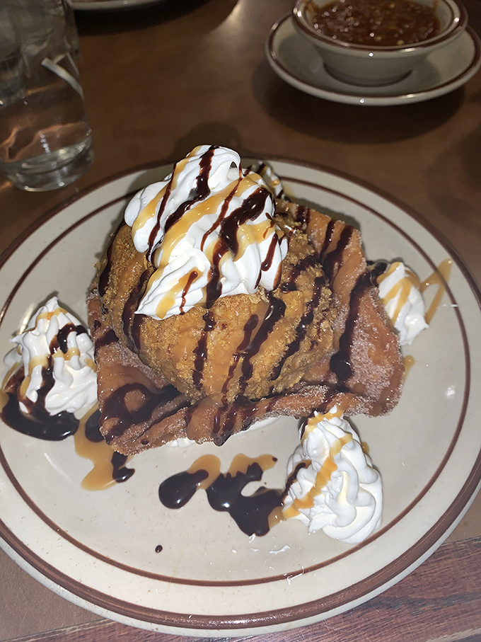 This isn't just fried ice cream&mdash;it's a sweet, crunchy contradiction wrapped in whipped cream and drizzled with pure joy.