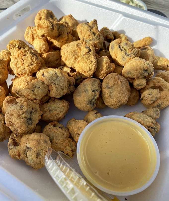 These golden-fried mushrooms aren't just appetizers&mdash;they're little umami bombs waiting to explode with flavor, complete with dipping sauce detonator.