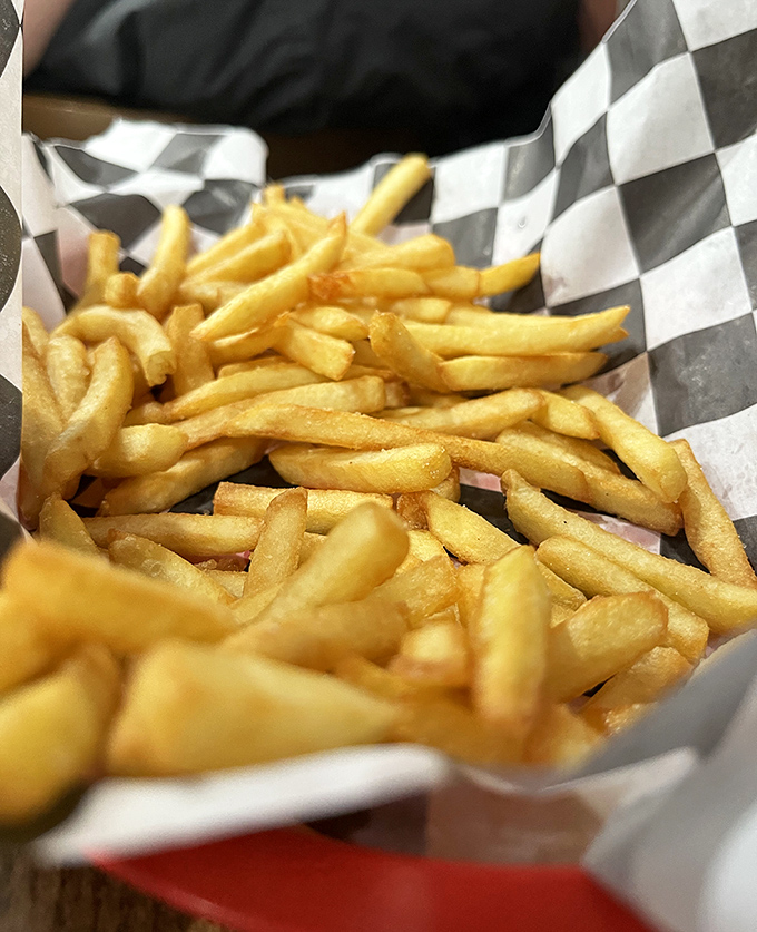 French fries that understand their supporting role &ndash; crispy, golden, and ready to soak up any sauce that might have escaped the chicken.