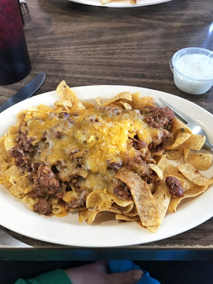 Frito pie that throws fancy culinary rules out the window &ndash; a glorious mess of chips, cheese and beef that somehow tastes like childhood and satisfaction.