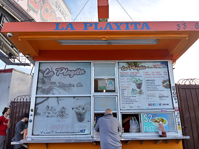 That "Pick Up Here" window might as well say "Life-Changing Seafood Experiences Dispensed Daily." The blue lettering is just more practical.