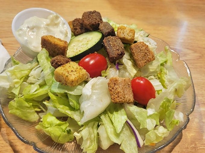 A garden salad that proves vegetables have a rightful place at a steakhouse&mdash;crisp, colorful, and crowned with house-made croutons.