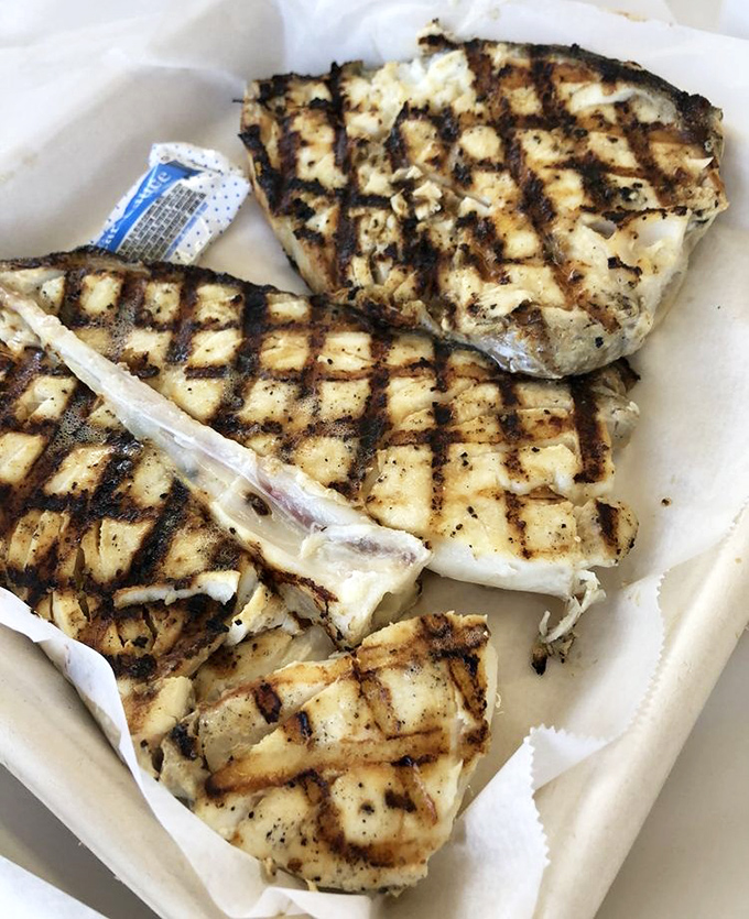 Perfectly grilled halibut with those coveted grill marks of distinction. Proof that sometimes the simplest preparation yields the most satisfaction.