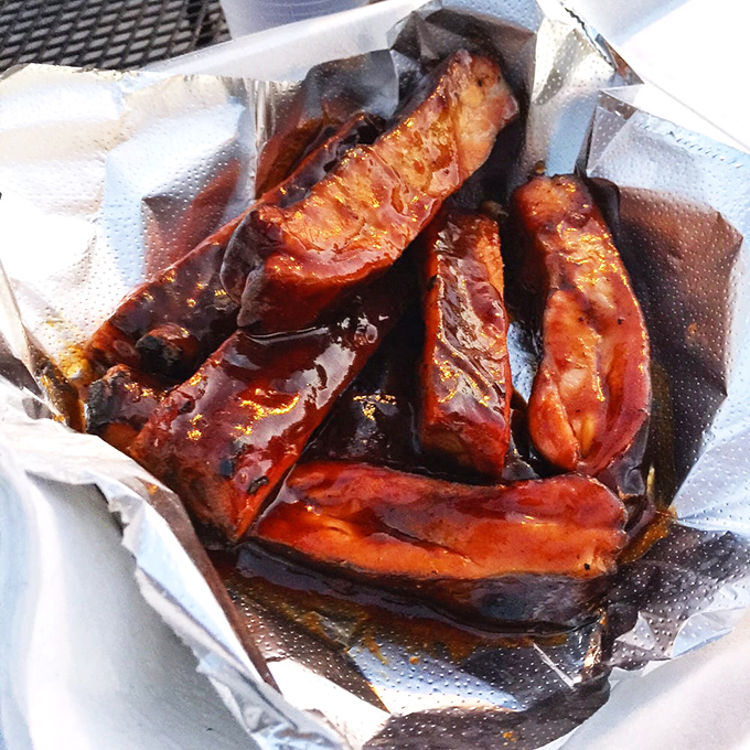 Ribs glistening with sauce like they've just stepped out of a barbecue fashion shoot&mdash;these aren't just cooked; they're pampered.