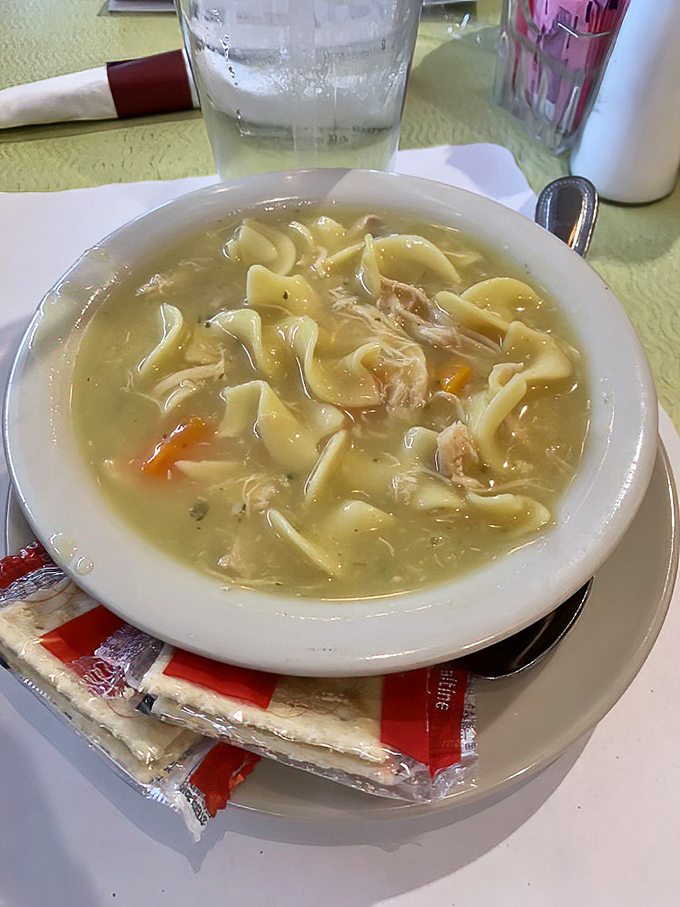 Chicken soup with noodles wide enough to use as tiny rafts&mdash;the penicillin your grandmother prescribed that actually works.