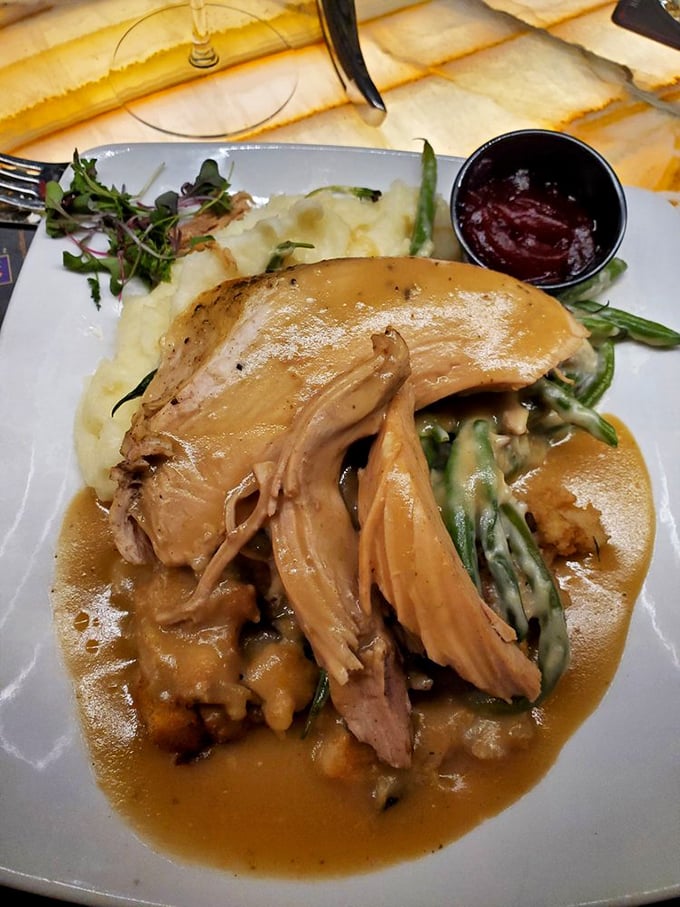 Herb-roasted turkey with asparagus shows this kitchen's versatility extends far beyond their famous beef specialties.