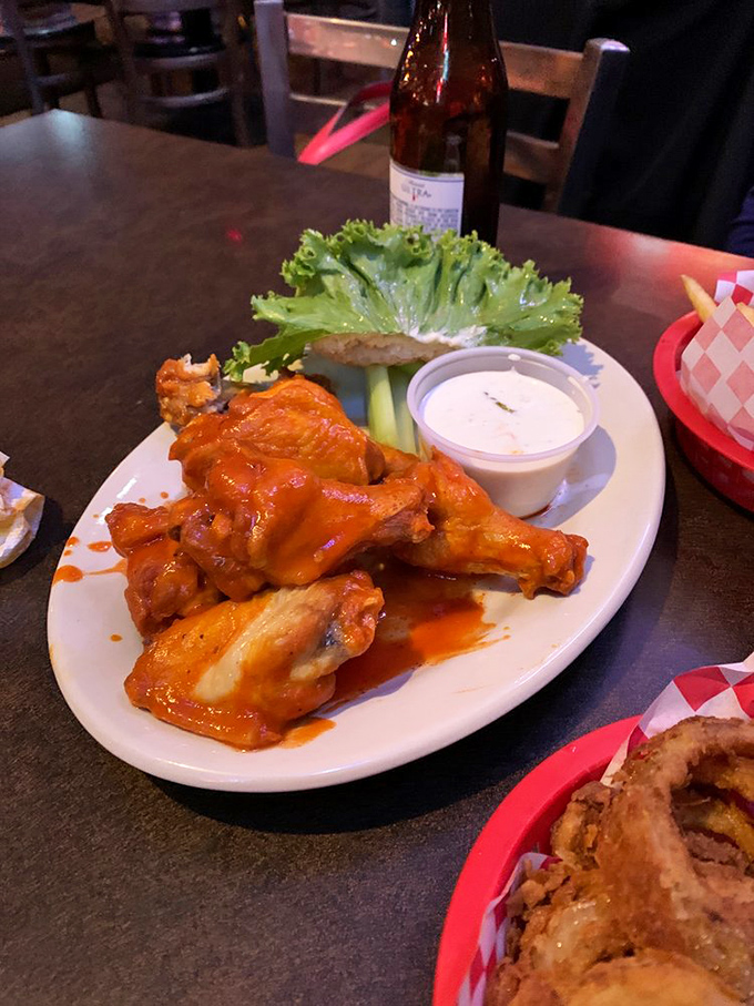 Buffalo wings bringing the heat! These saucy delights prove Dinker's excellence extends beyond the burger universe.