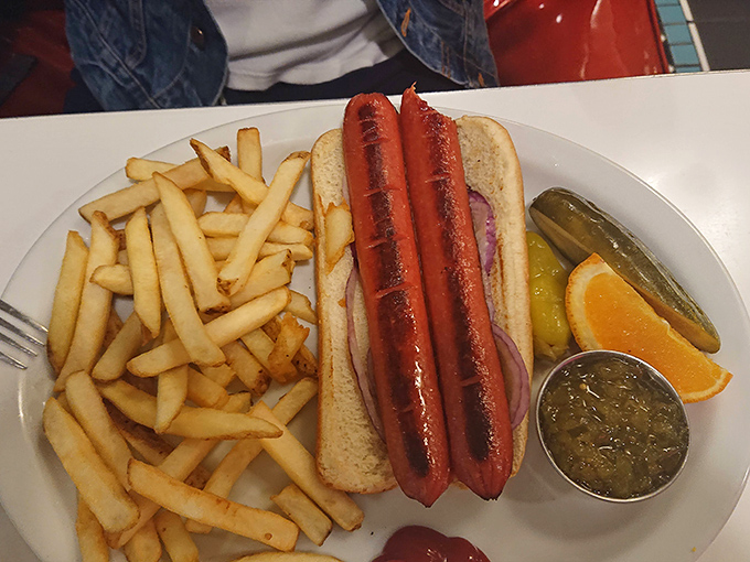 This hot dog has clearly been told it's just a sandwich, and responded by dressing up in grilled finery to prove it's so much more.