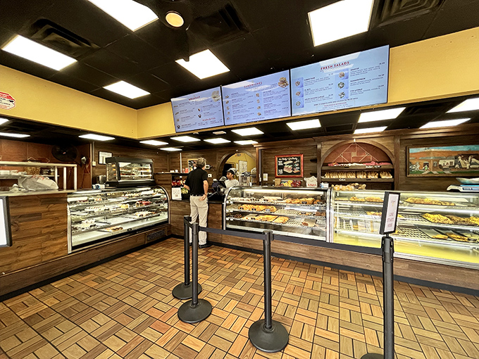 The interior blends efficiency with charm, like a well-choreographed dance. Every square inch dedicated to the serious business of deliciousness.