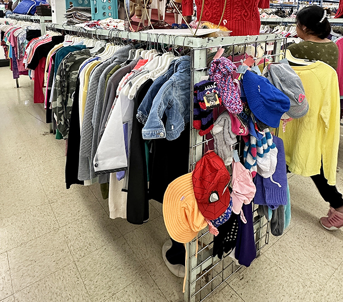 The children's section: where tiny fashionistas-in-training can build their wardrobes without parents building credit card debt. Spider-Man hats included!