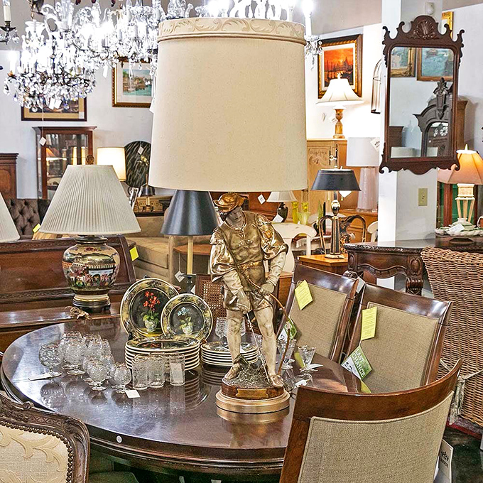This dining vignette proves that sometimes the most interesting guest at your dinner party might be the lamp watching over the proceedings.