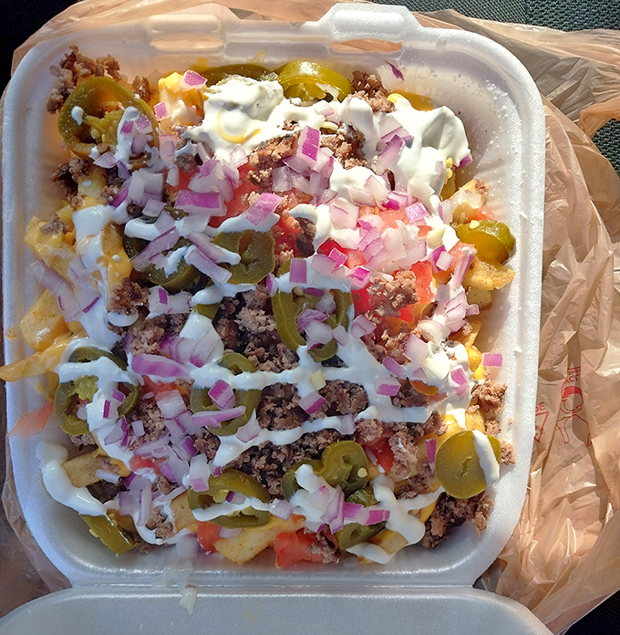 Nacho fries that blur the line between appetizer and main event. A fiesta of flavors that makes sharing both necessary and nearly impossible.