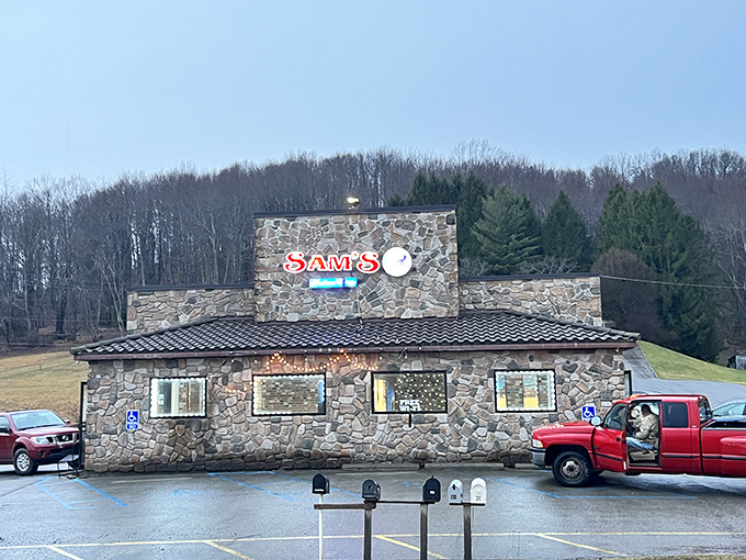 Sam's stone exterior promises the kind of no-nonsense comfort food that makes diet plans spontaneously combust. Calories don't count when they're served with local history.