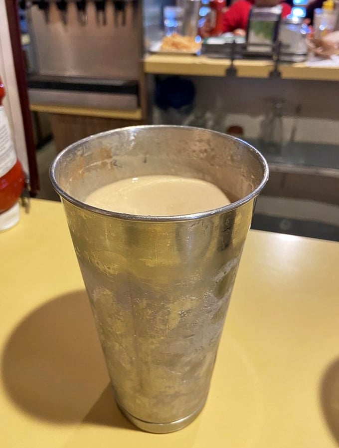 The classic malt in its traditional metal mixing cup. Cold, creamy counterpoint to all that warm, buttery goodness&mdash;balance in all things.