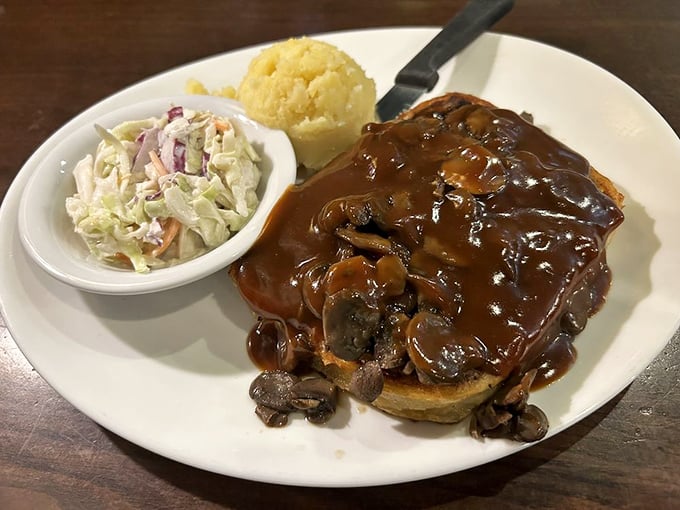 Meatloaf gets the royal treatment. This Wellington-style creation smothered in mushroom gravy proves that British-American fusion can be gloriously delicious.