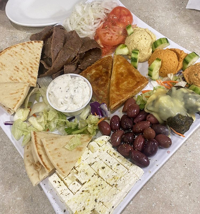 The mezethes platter &ndash; a United Nations of flavor where every bite is a delicious diplomatic mission worth undertaking.