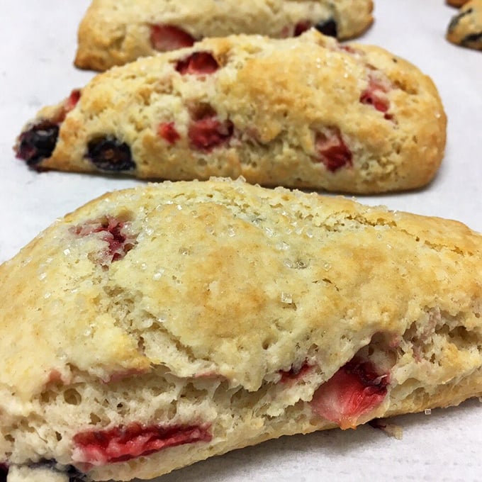 Berry-studded scones with golden exteriors that shatter perfectly with each bite. Butter's best friend in triangular form.