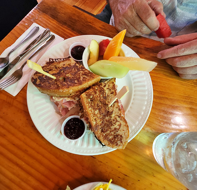 Monte Cristo sandwich with fresh fruit - because balancing decadence with nutrition is the adult version of having it all.