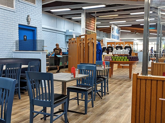 Airy and inviting, the dining room's blue chairs and wooden accents create the perfect backdrop for morning conversations and pancake revelations.