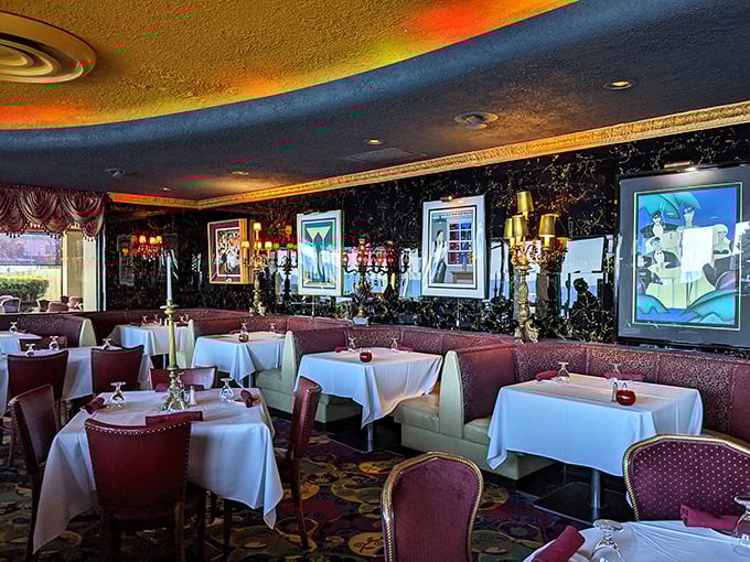 The dining room's dramatic ceiling, ornate moldings, and plush seating create the feeling that dinner isn't just a meal&mdash;it's a grand occasion worth celebrating.