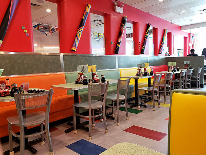 The diner's vibrant interior is like a 1950s soda shop that collided with an art gallery – comfortable, colorful, and completely captivating.