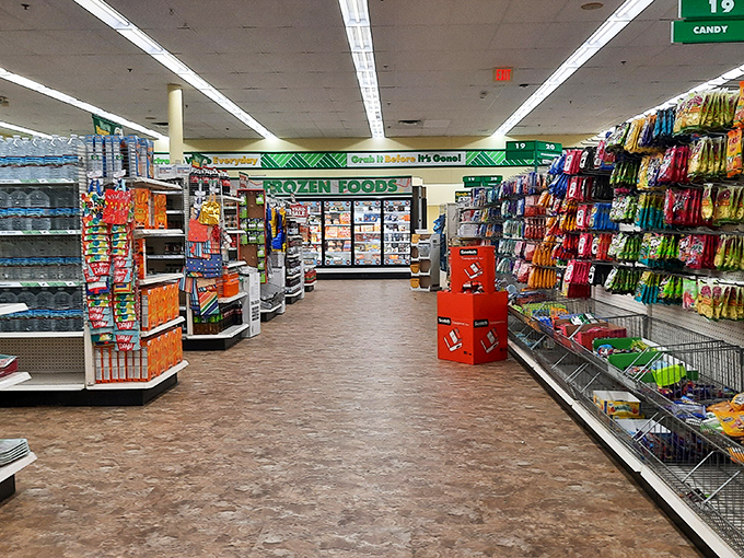 The main aisle beckons with promises of frozen treasures ahead and snack temptations to the right. Resistance is futile.