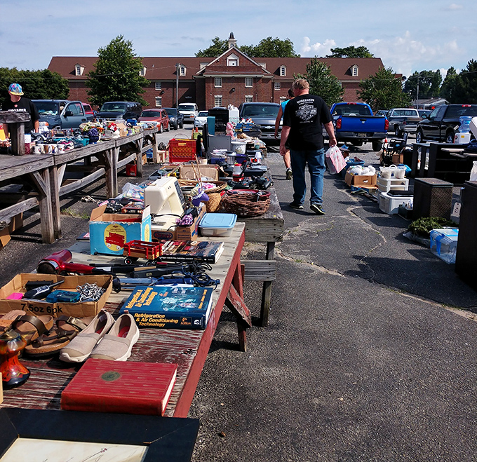 The outdoor market transforms parking lots into possibility fields, where one person's castoffs become another's perfect find.