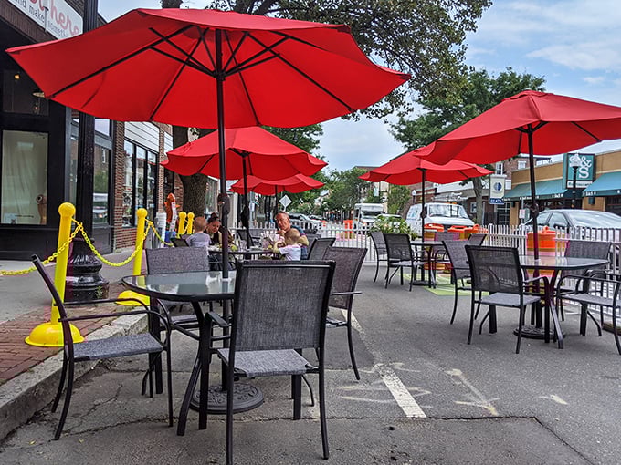 When summer graces Cambridge, The Druid spills outdoors, where red umbrellas stand like cheerful sentinels over al fresco feasts.