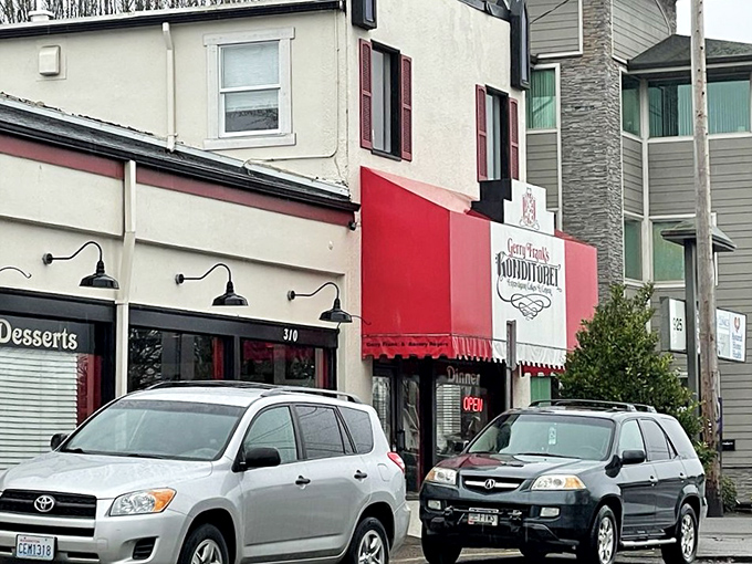 The distinctive red awnings serve as Salem's unofficial bat signal for those experiencing acute cheesecake cravings from miles away.