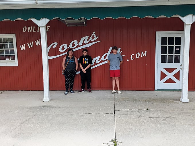 The barn-red exterior stands as a beacon of sweetness on the rural landscape. Even the website painted on the side feels charmingly old-school in our digital world.