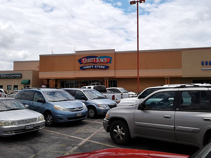 The iconic Thrift Town sign stands as a beacon for bargain hunters, like the North Star for those navigating by the light of frugality.