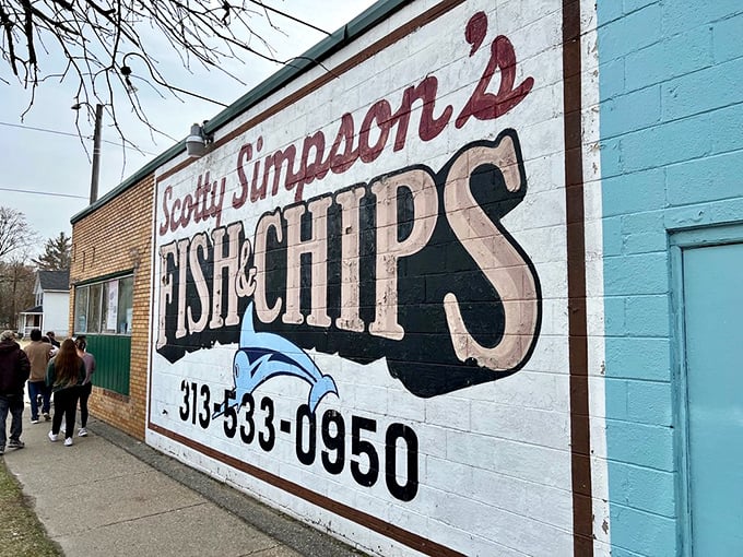 The mural that's become a Detroit landmark. This painted promise of "FISH & CHIPS" has lured hungry visitors to this corner for decades.