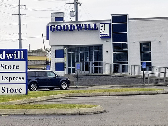 The modern face of Goodwill welcomes a steady stream of donors and shoppers. This unassuming building houses a community of bargain hunters and second-chance believers. 