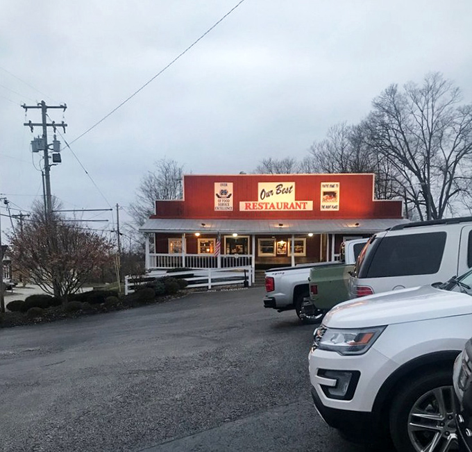As evening approaches, the red exterior glows like a lighthouse for hungry travelers, promising safe harbor for empty stomachs and weary souls.