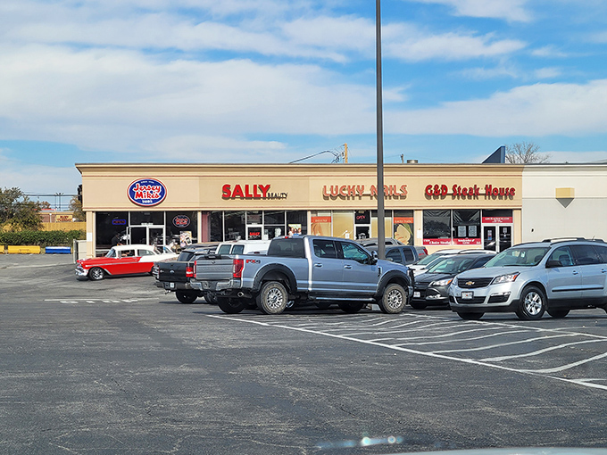 The unassuming strip mall exterior might not scream "culinary destination," but those packed parking spaces tell the real story about what's inside.