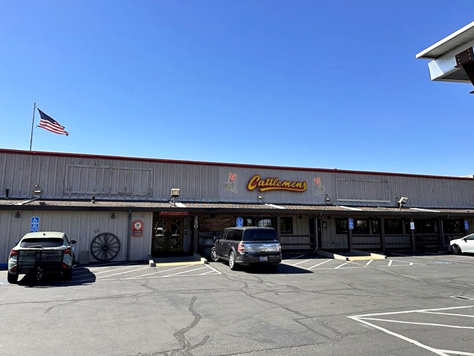 Under California's blue skies, this humble building houses meat magic that rivals any fancy big-city steakhouse. The American flag flies proudly over protein paradise.