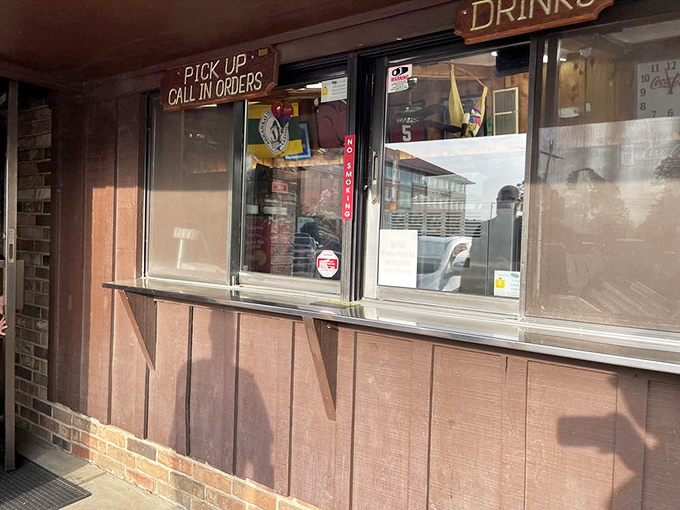 The pick-up window&mdash;where eager hands receive paper-wrapped bundles of joy that somehow taste even better in the car.