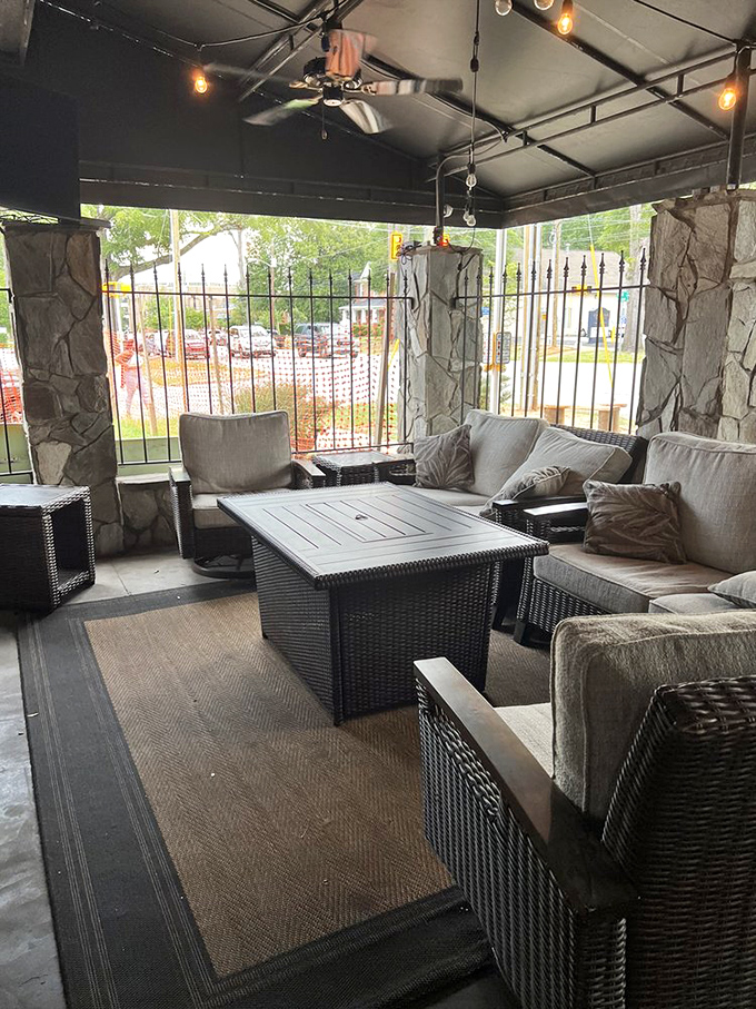The outdoor patio offers a sheltered retreat where cushioned seating and fresh air enhance every bite and sip.