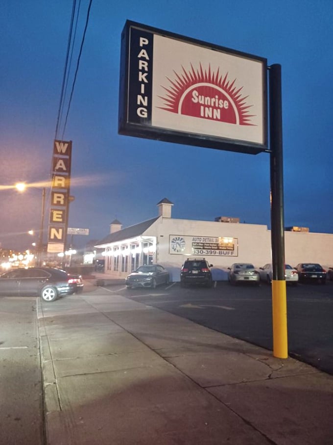 As dusk settles over Warren, the Sunrise Inn sign illuminates like a North Star for the pizza-hungry masses seeking guidance.