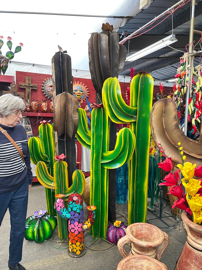 Metal cacti stand at attention—the perfect yard art for snowbirds who want desert charm without the prickly maintenance issues.
