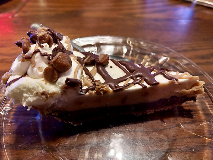 A slice of peanut butter pie that doesn't need a fancy French name to tell you it's the perfect finale to your steakhouse symphony.