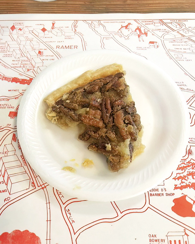 This isn't just pecan pie&mdash;it's Alabama's soul on a plate, served atop a map that reminds you exactly where this sweet, nutty perfection was born.