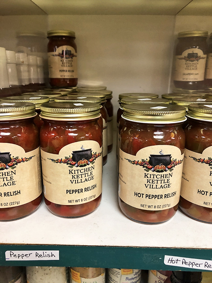 Homemade relishes and preserves line the shelves like edible time capsules, each jar containing generations of Pennsylvania Dutch cooking wisdom.
